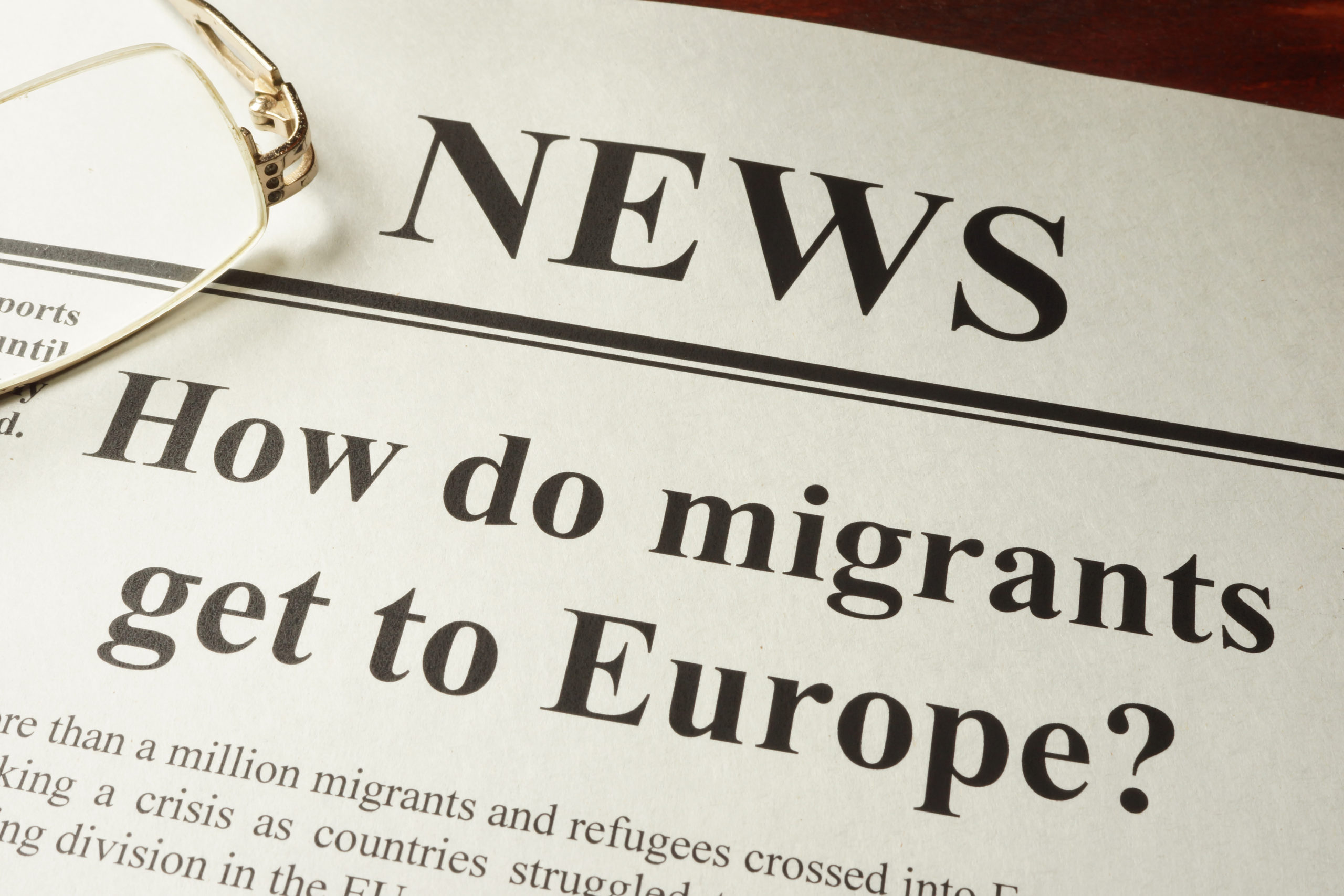 Newspaper with header news and How do migrants get to Europe? - Jean ...